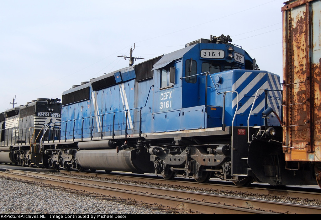CEFX SD-40-2 #3161 is last out on this westbound consist passing Main St.